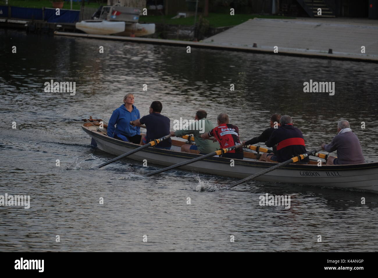 six man cutter boat rowers and cox Stock Photo - Alamy