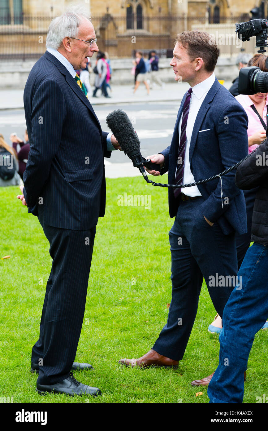 London, UK. Conservative politician Peter Bone gives a TV interview in ...