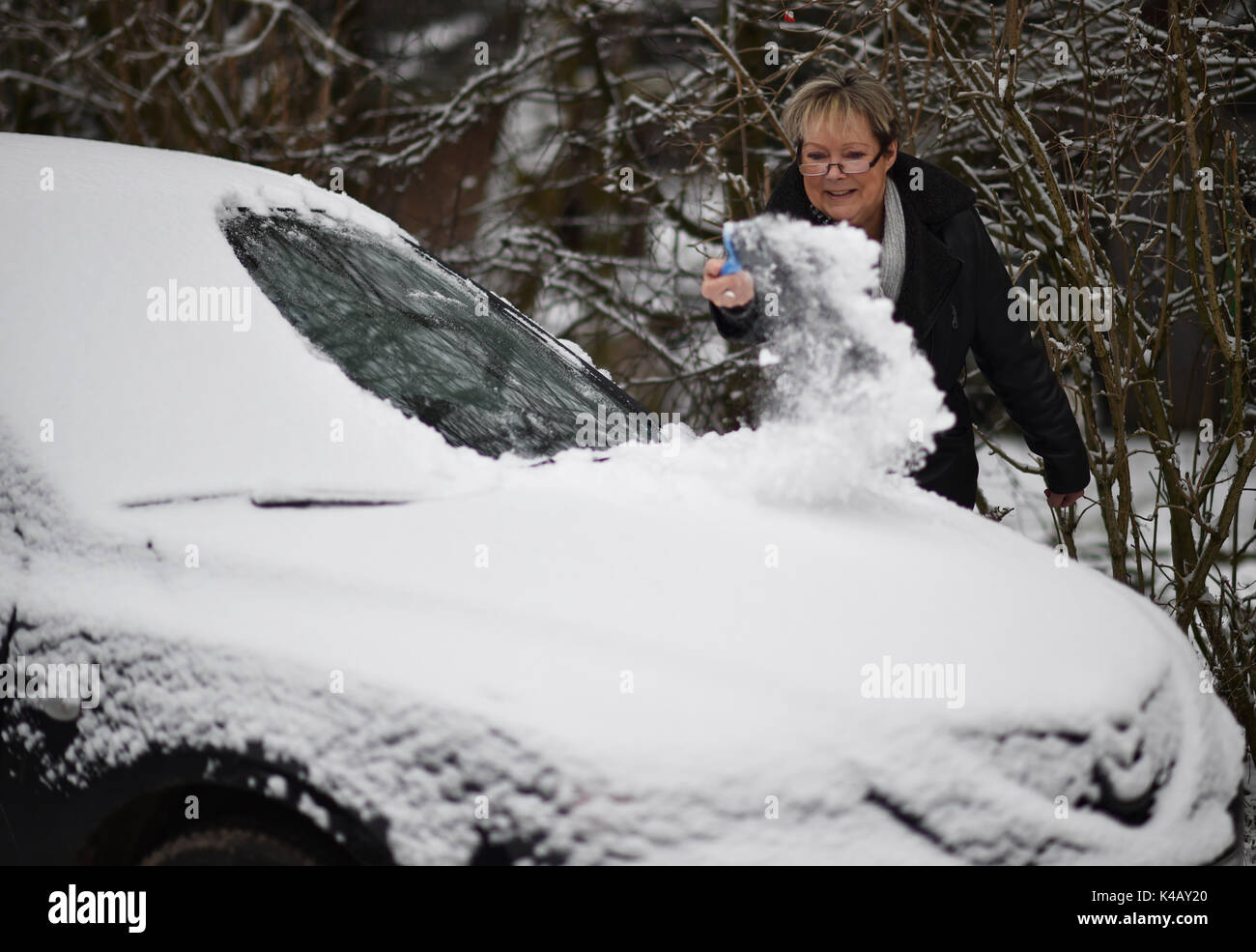 Sweep snow hi-res stock photography and images - Alamy