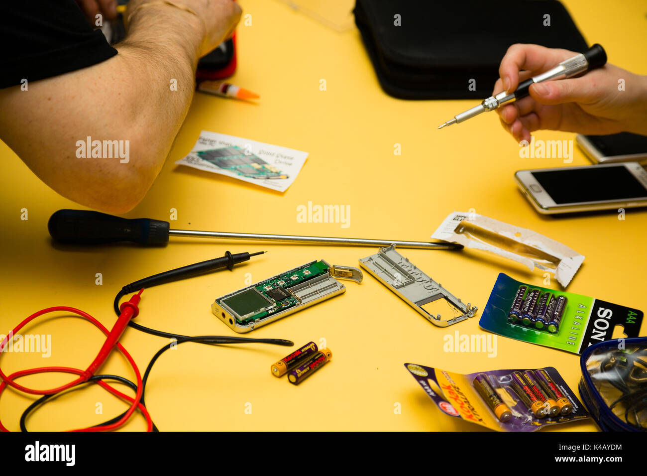 London, UK. The components of a broken voice recorder are seen on a ...