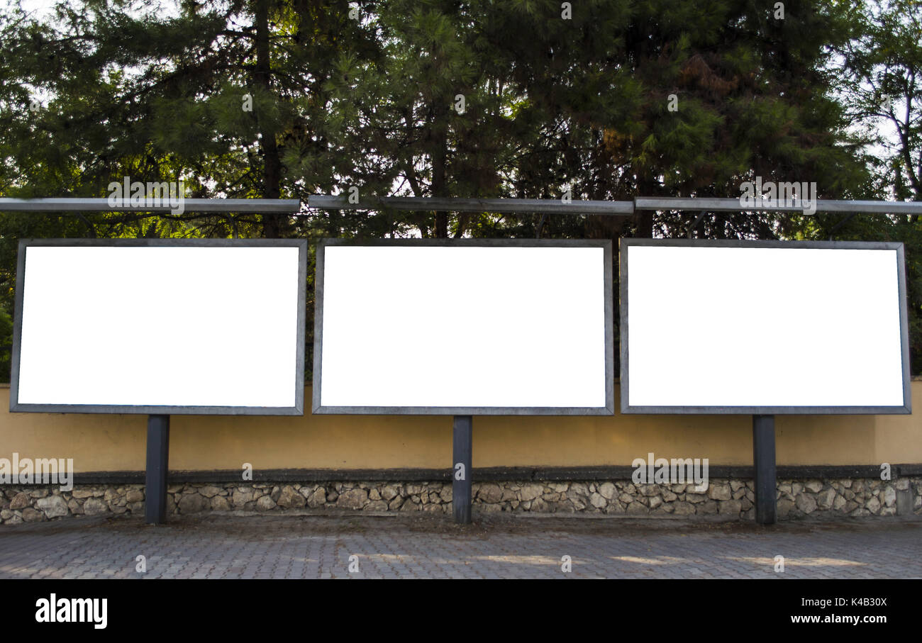 Three white billboards side by side Stock Photo - Alamy