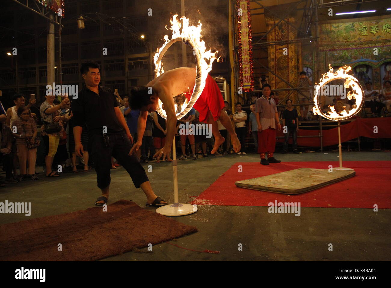 Hong Kong, . 5th Sep, 2017. Taoist Monk jump through the fire ring as ...