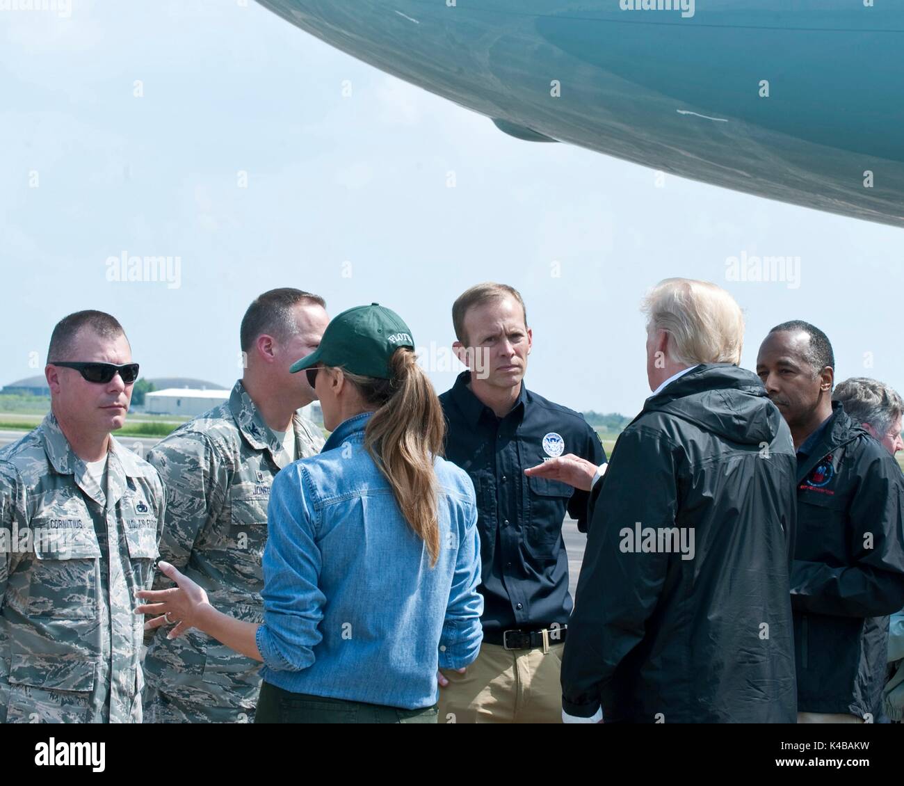 U.S. President Donald Trump chats with FEMA Administrator Brock Long ...