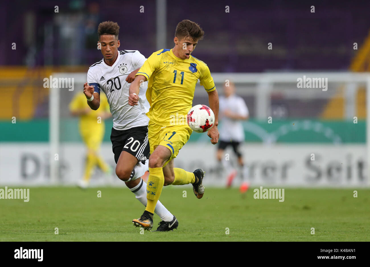 Germany's Thilo Kehrer (l) and Kosovo's Enis Bytyqi in action during ...