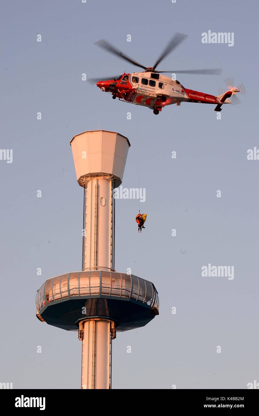 Coastguard helicopter rescues trapped people from Skyline Tower in ...