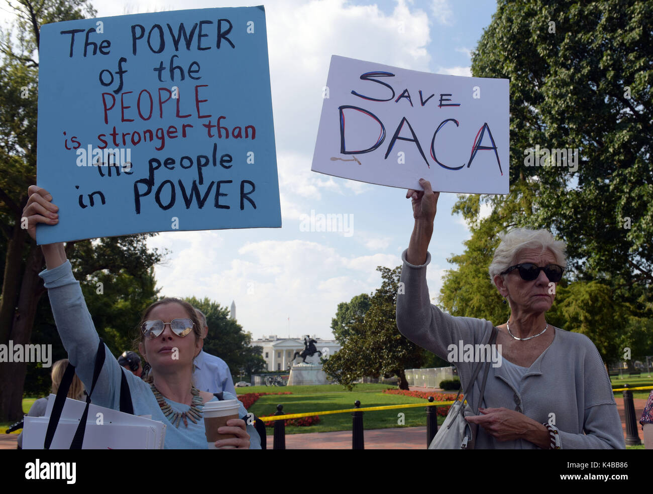 Washington, USA. 5th Sep, 2017. People attend a rally protesting ...