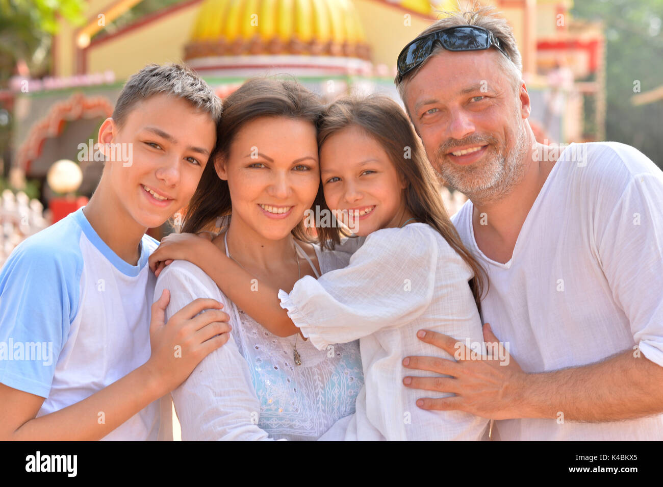 Happy family posing Stock Photo - Alamy