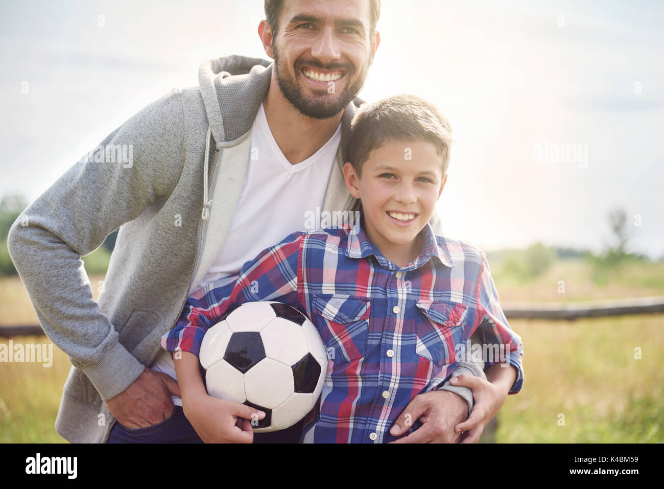 Portrait father son football hi-res stock photography and images - Alamy