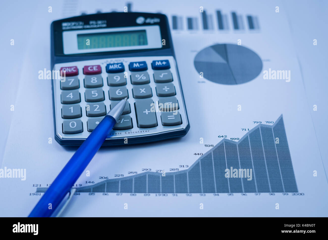 Pen, graphs, calculator, finance concept, home economics Stock Photo ...