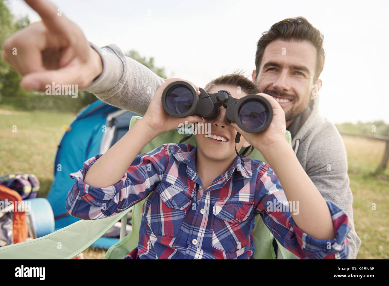 Father observing hi-res stock photography and images - Alamy