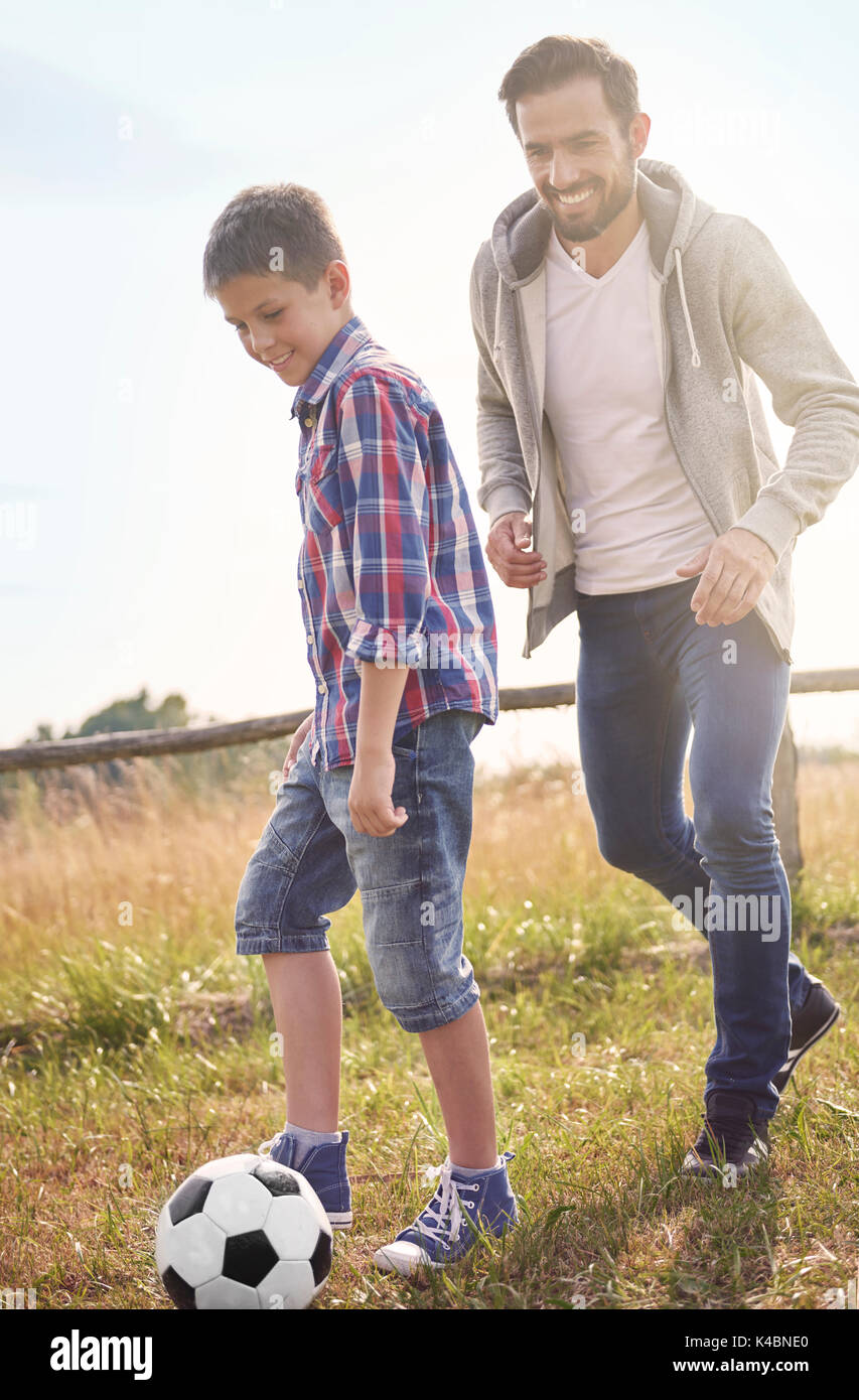 Sport football action father son hi-res stock photography and images ...