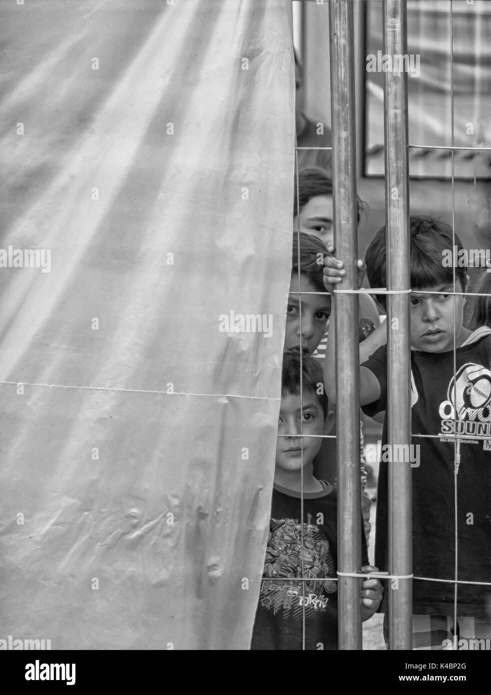 Refugee Children Behind Barriers Stock Photo - Alamy