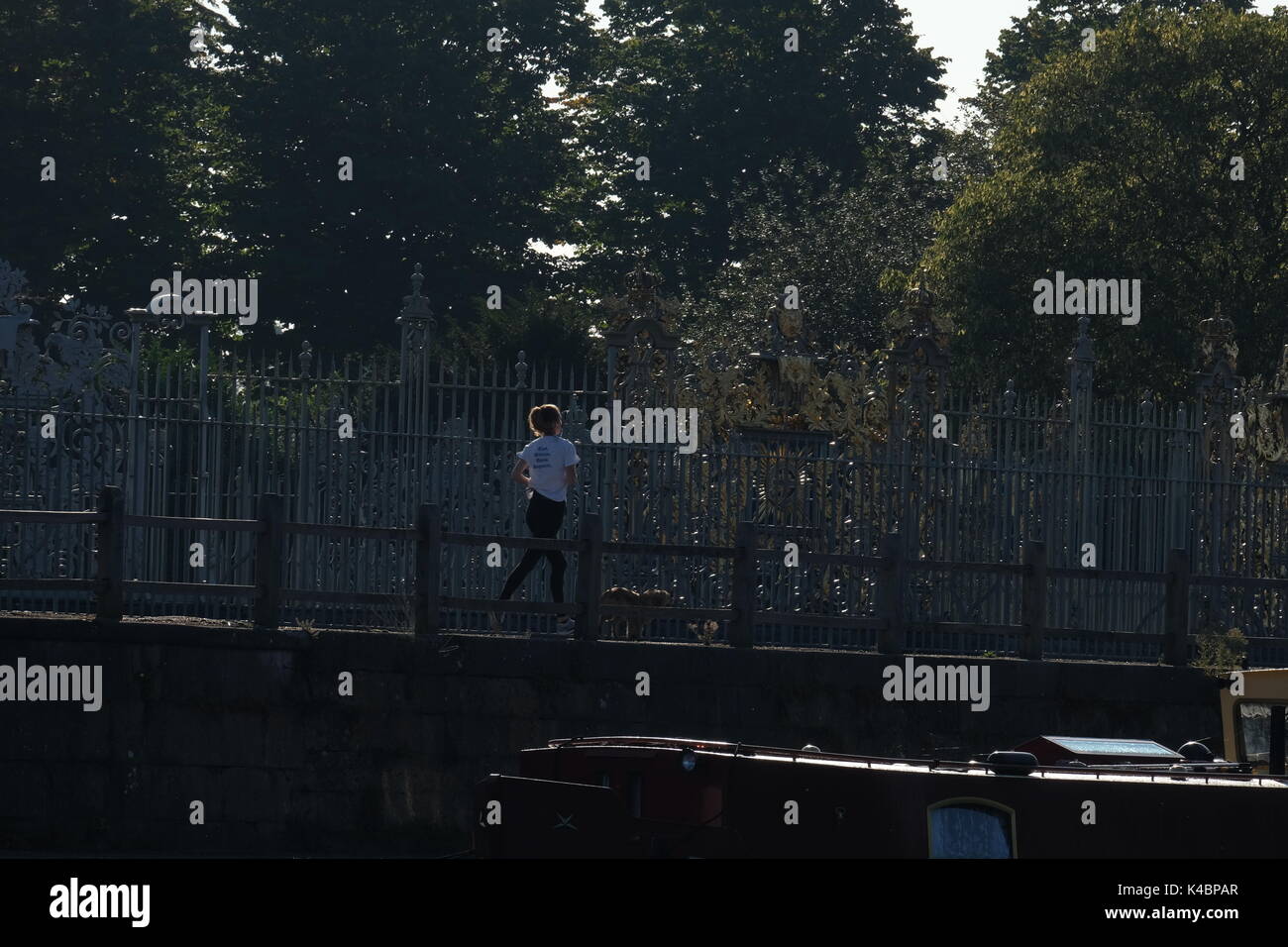 runner on tow path Stock Photo - Alamy