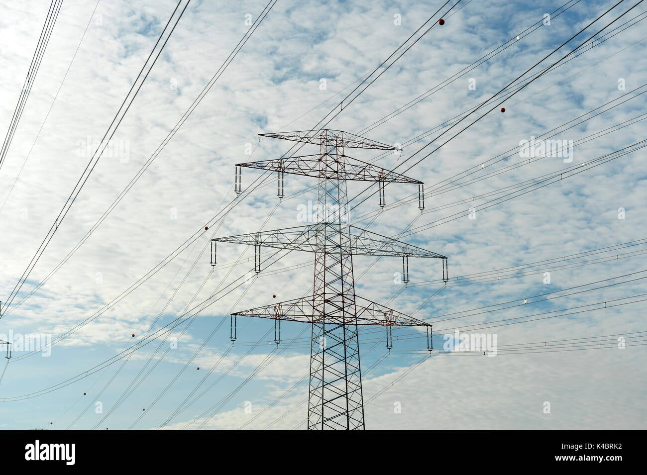 Power Masts Of High Voltage Cables Stock Photo - Alamy