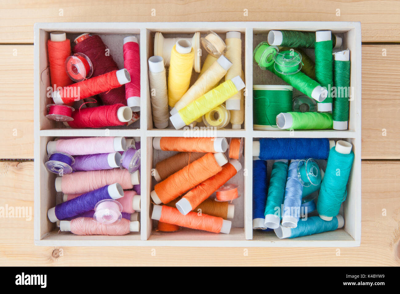 Colorful Sewing Yarns Stock Photo - Alamy