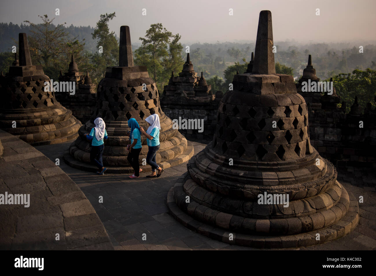 Muslim local tourists at the Borobudur Temple in Java, Indonesia Stock ...