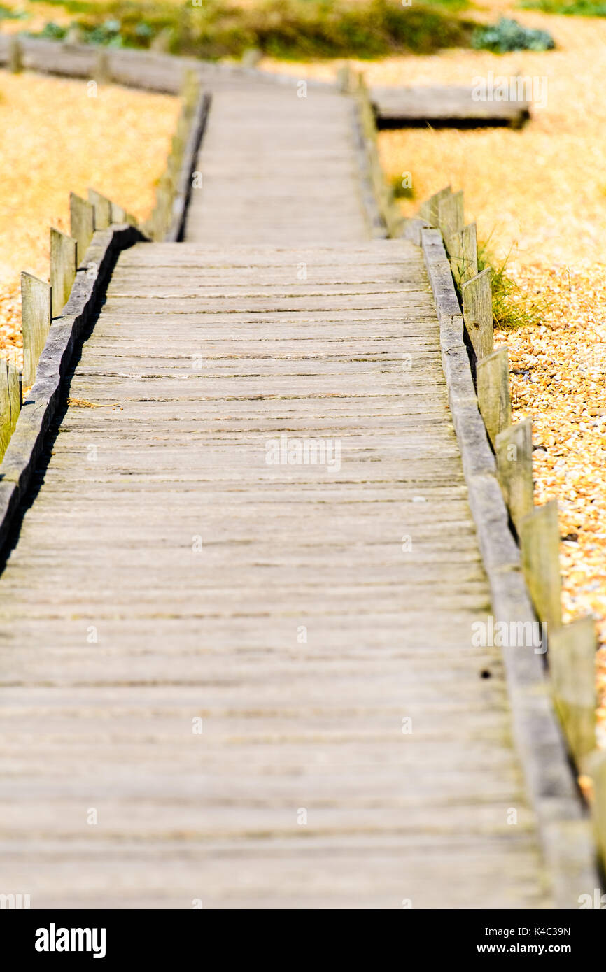 Wooden Walkway at Dungeness Estate in Kent Stock Photo - Alamy