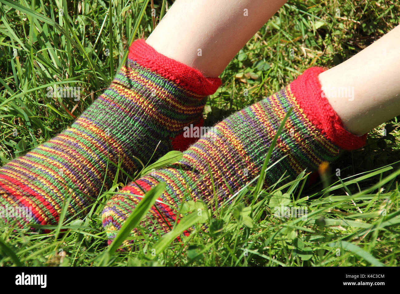 Handknitted Socks On Legs Stock Photo - Alamy