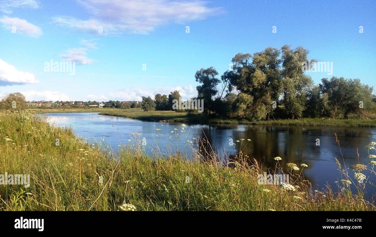 Summer landscape with a view of the river bend with a high Bank in the ...