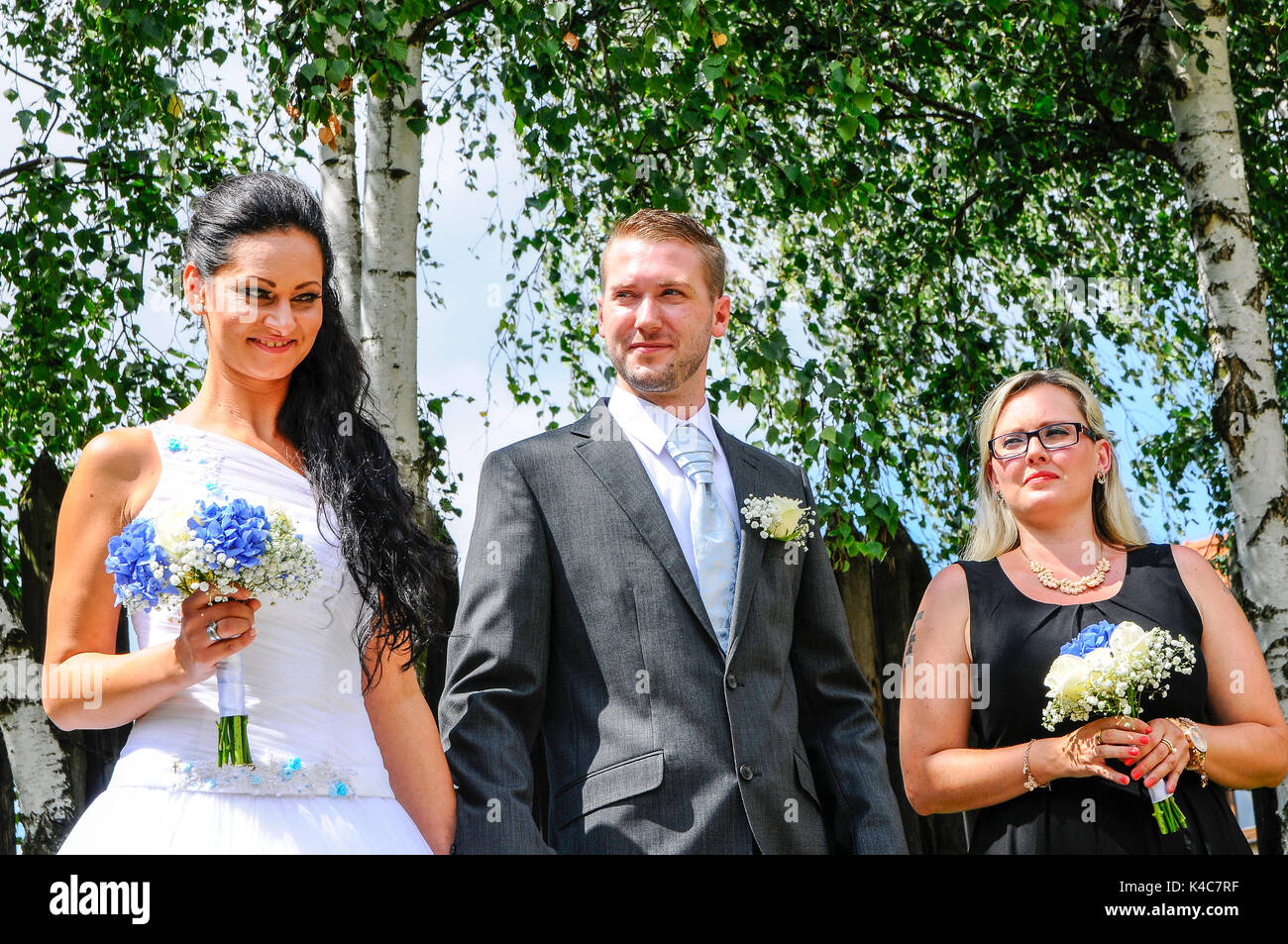 beautiful white married couple in wedding and summer day give a living ...