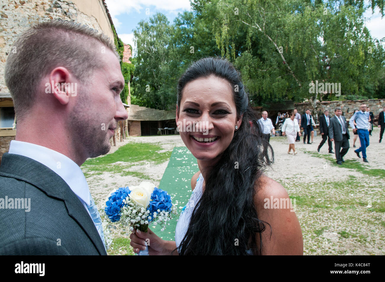 beautiful white married couple in wedding and summer day give a living ...