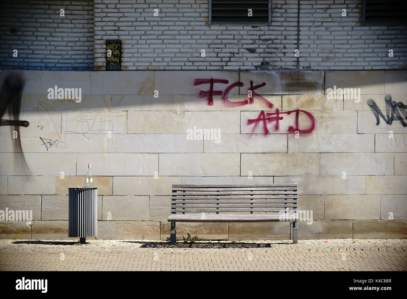 Bench and bins hi-res stock photography and images - Alamy