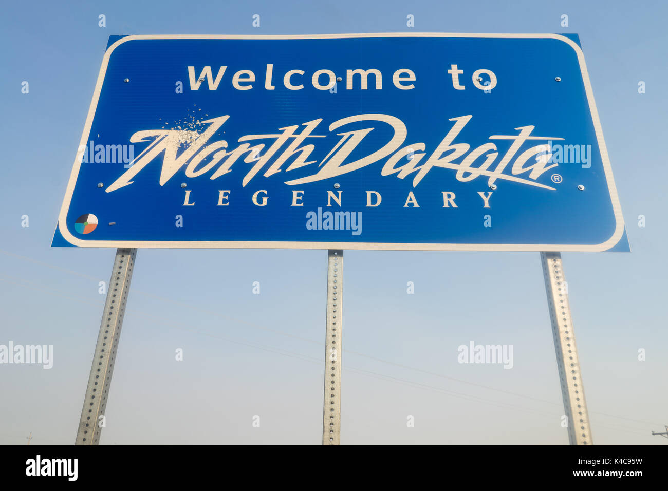 The scene is all blue at an entrance to North Dakota Road Sign Stock ...