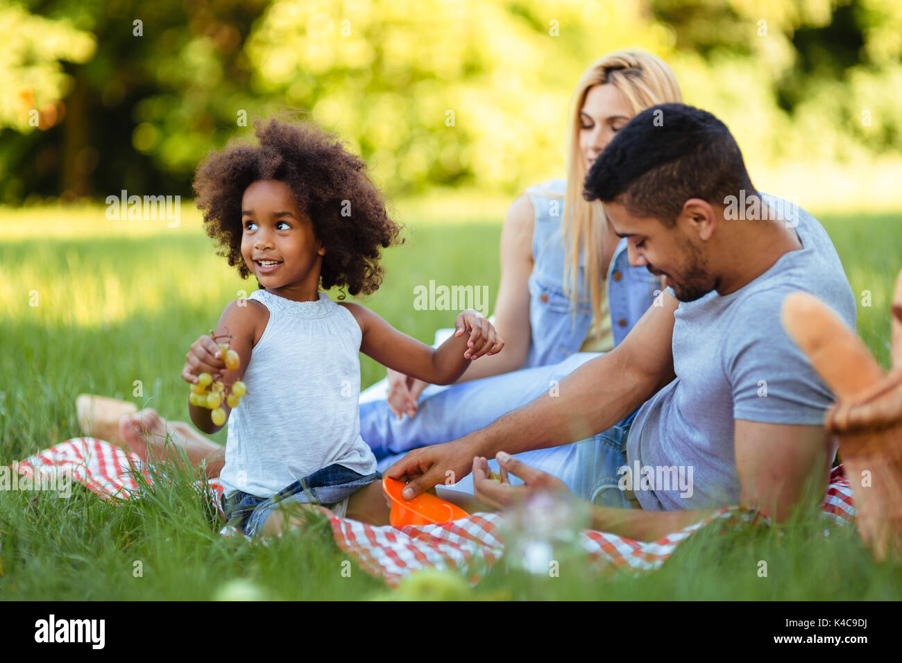 Joyful family having fun outdoors hi-res stock photography and images ...