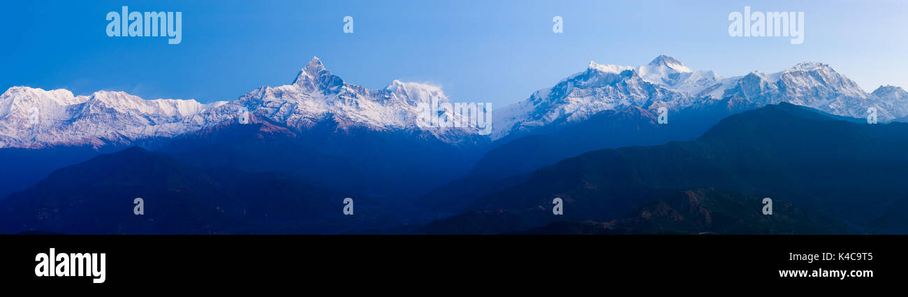 Sweeping panoramic landscape view of snow-capped Annapurna Himalayan ...