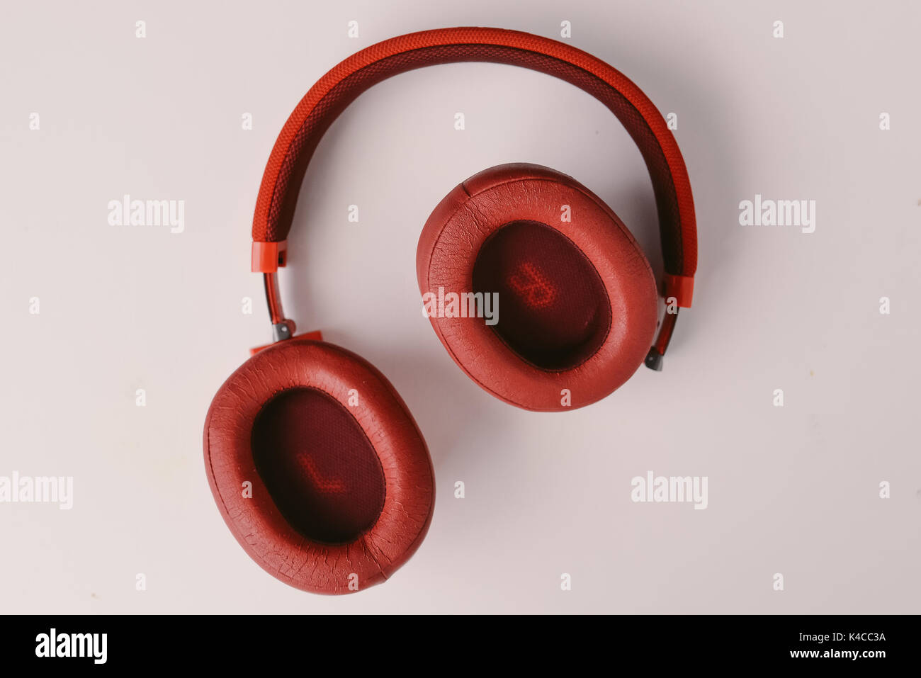 Red Over the ear headphones Stock Photo - Alamy