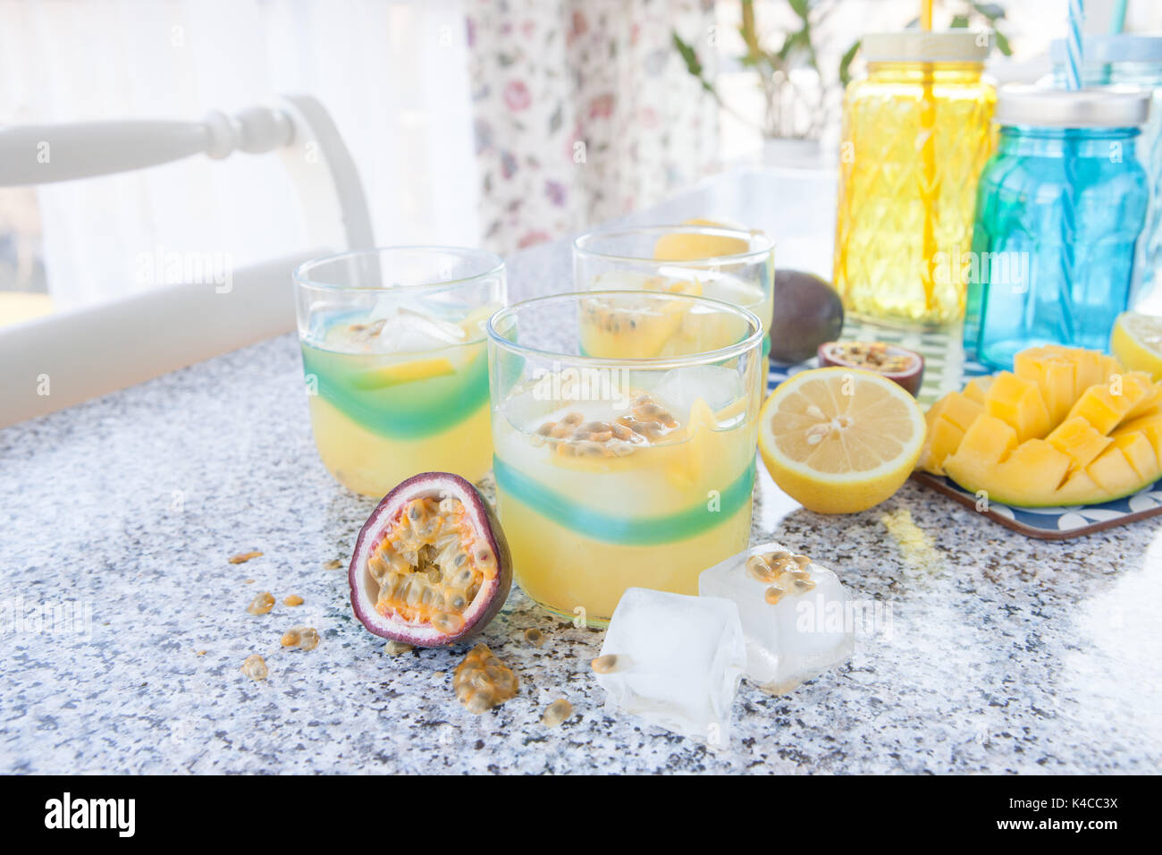 Cocktail With Mango And Passion Fruit Stock Photo - Alamy