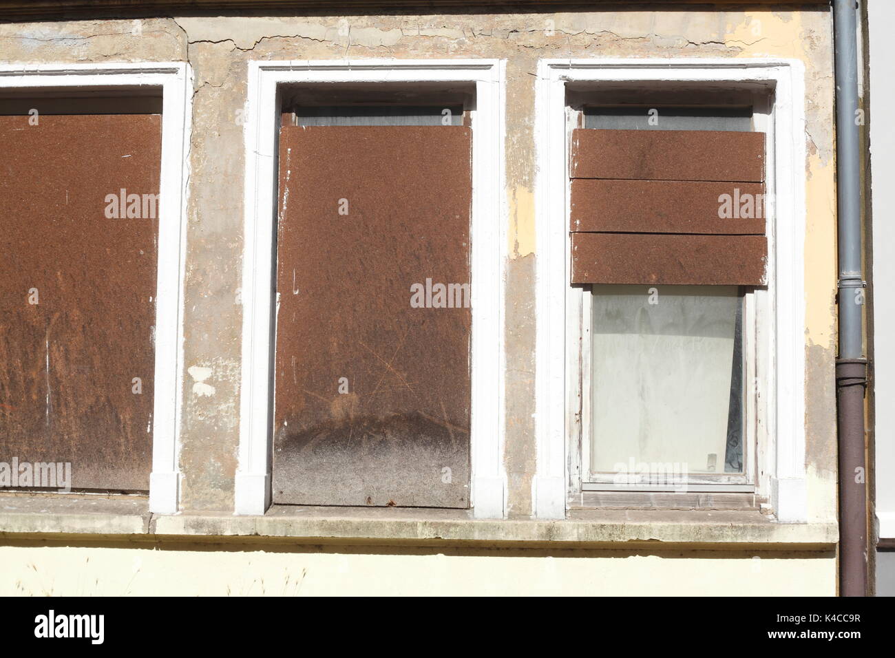 barricaded old windows on an old house Stock Photo - Alamy