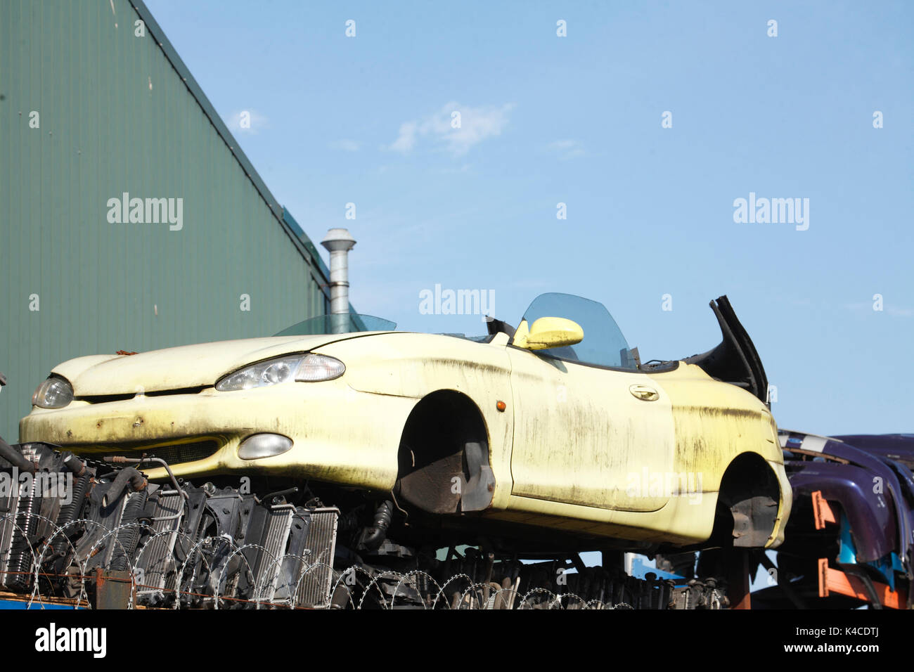 scrap metal car on scrap yard Stock Photo - Alamy