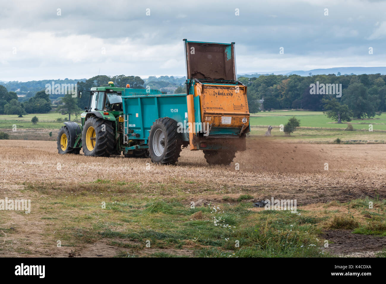 Rolland V2-170 Muck Spreader at Work Stock Photo - Alamy Rolland V2-170 Muck Spreader at Work Stock Photo - Alamy