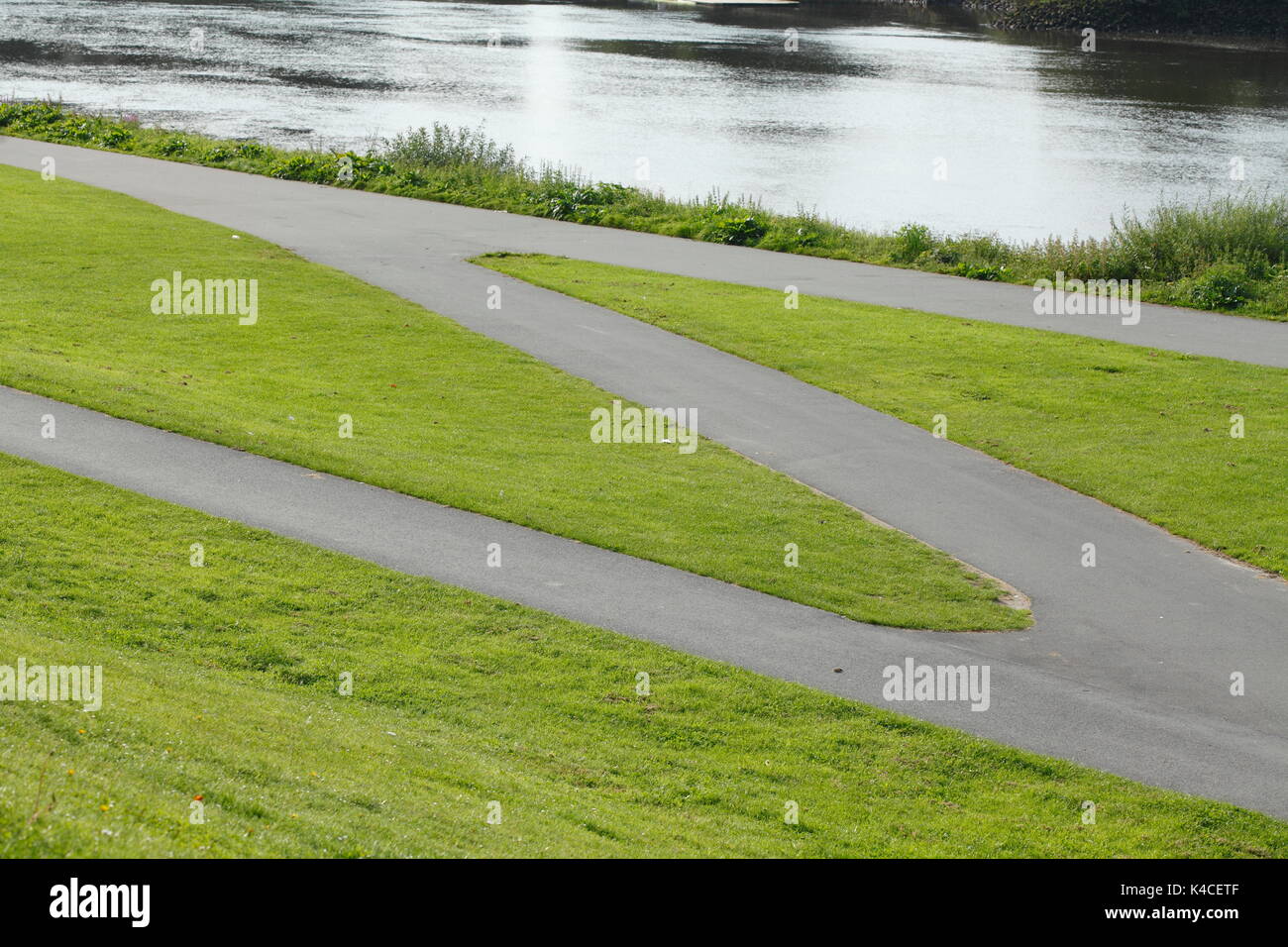 Walk in a Park with lawn Stock Photo - Alamy