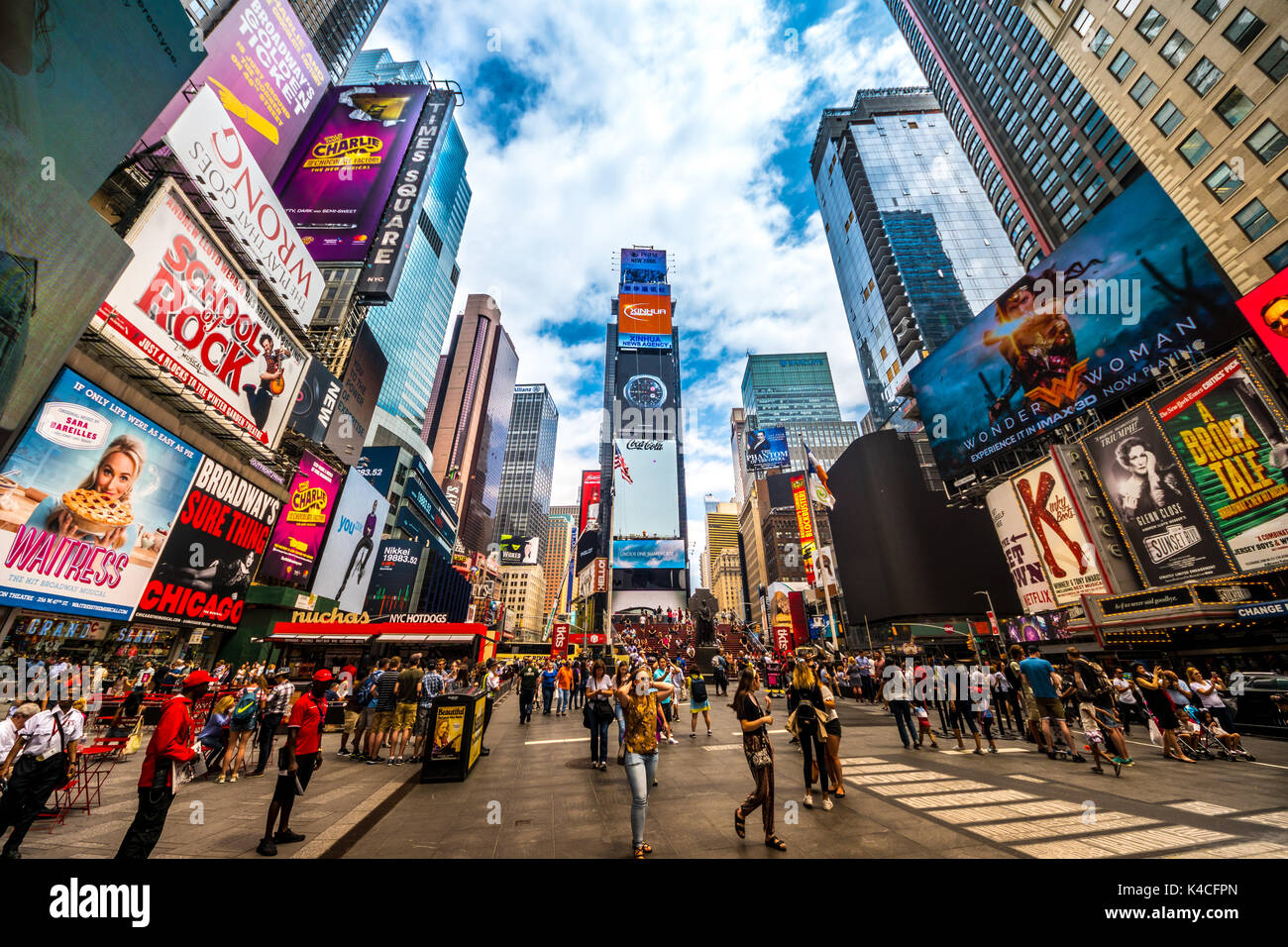 Busy Times Square in NYC. The place is famous as world's busiest place ...