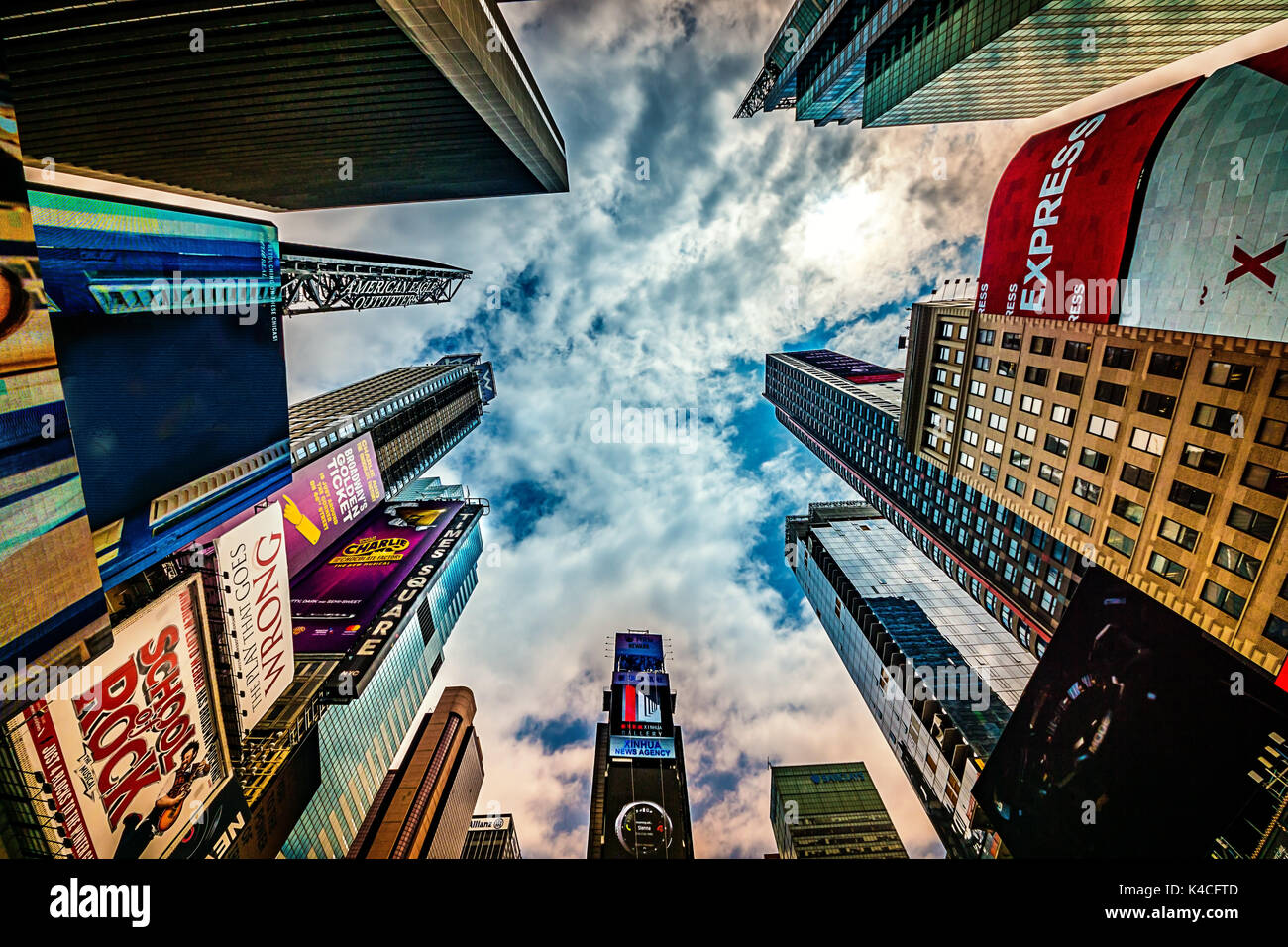 High rising skyscrapers at Times Square in NYC. The place is famous as ...