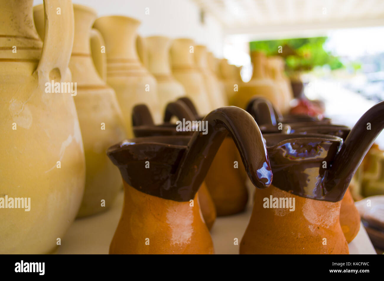 Beautiful handmade clay pots with arts Stock Photo - Alamy