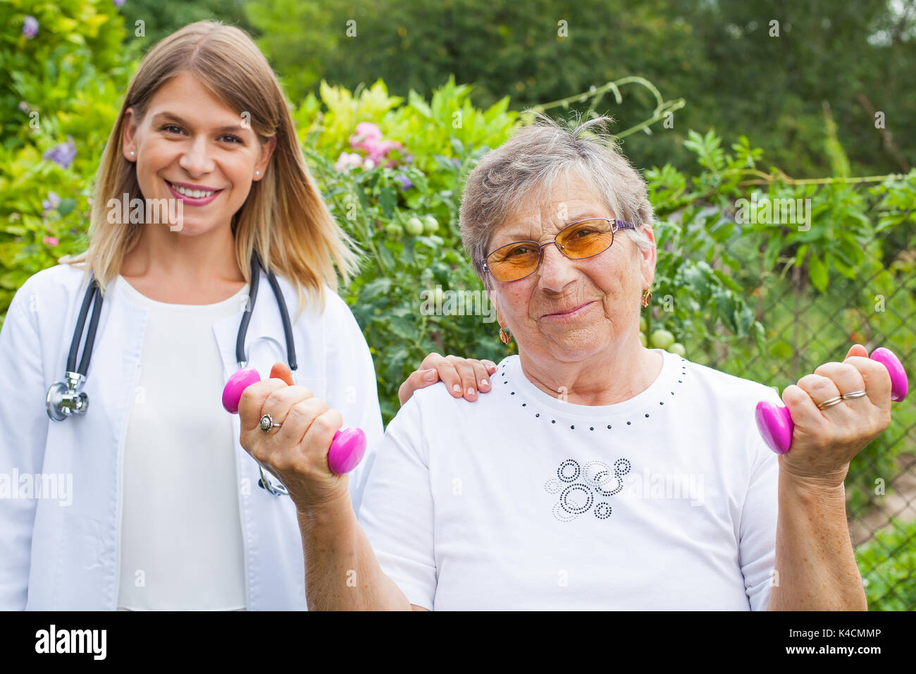 Doctor doing recovery exercises disabled hi-res stock photography and ...