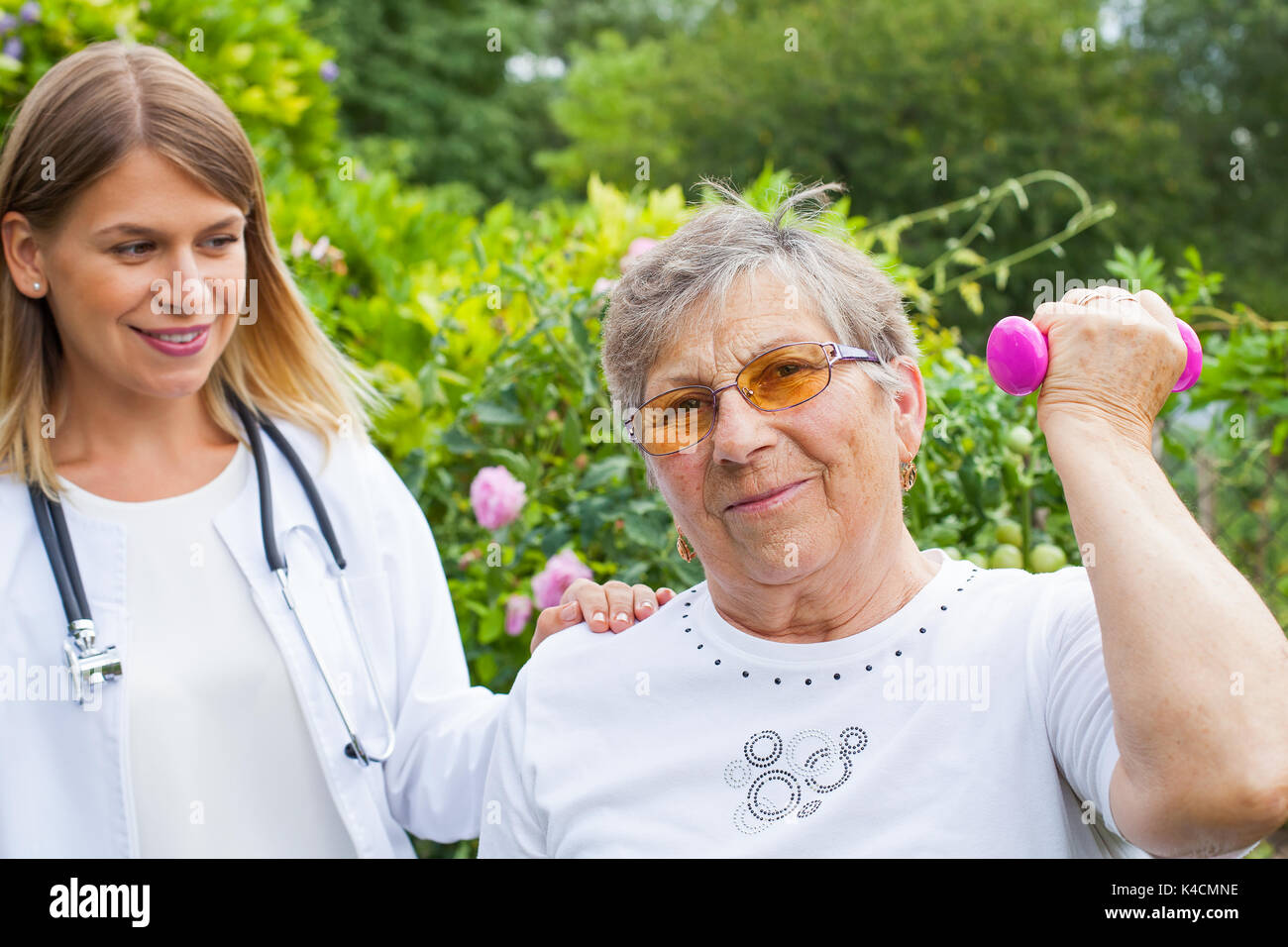 Doctor doing recovery exercises disabled hi-res stock photography and ...