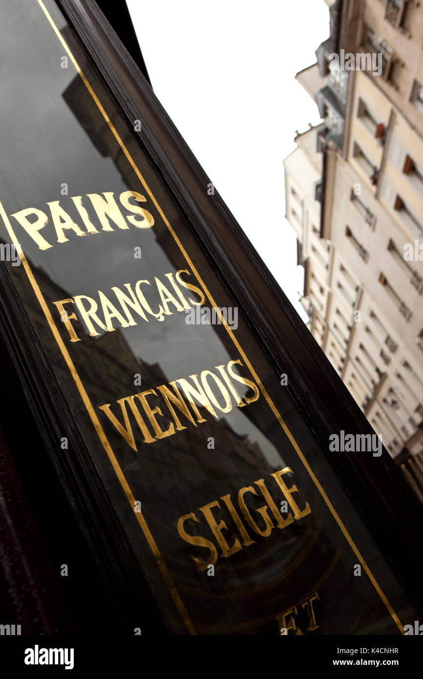 Old retro signs on the facade of a French bakery Stock Photo - Alamy