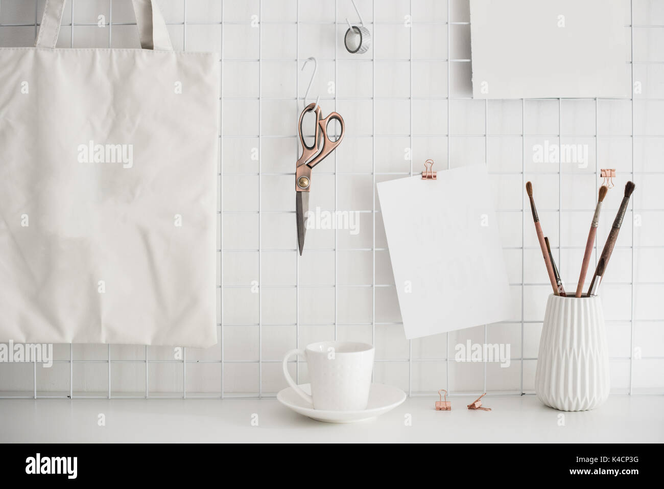 Clean and tidy workspace, white table top and office organizer with ...