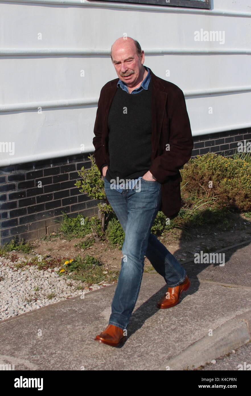 Denis Lill arriving at the Venue Cymru Llandudno Wales Stock Photo - Alamy