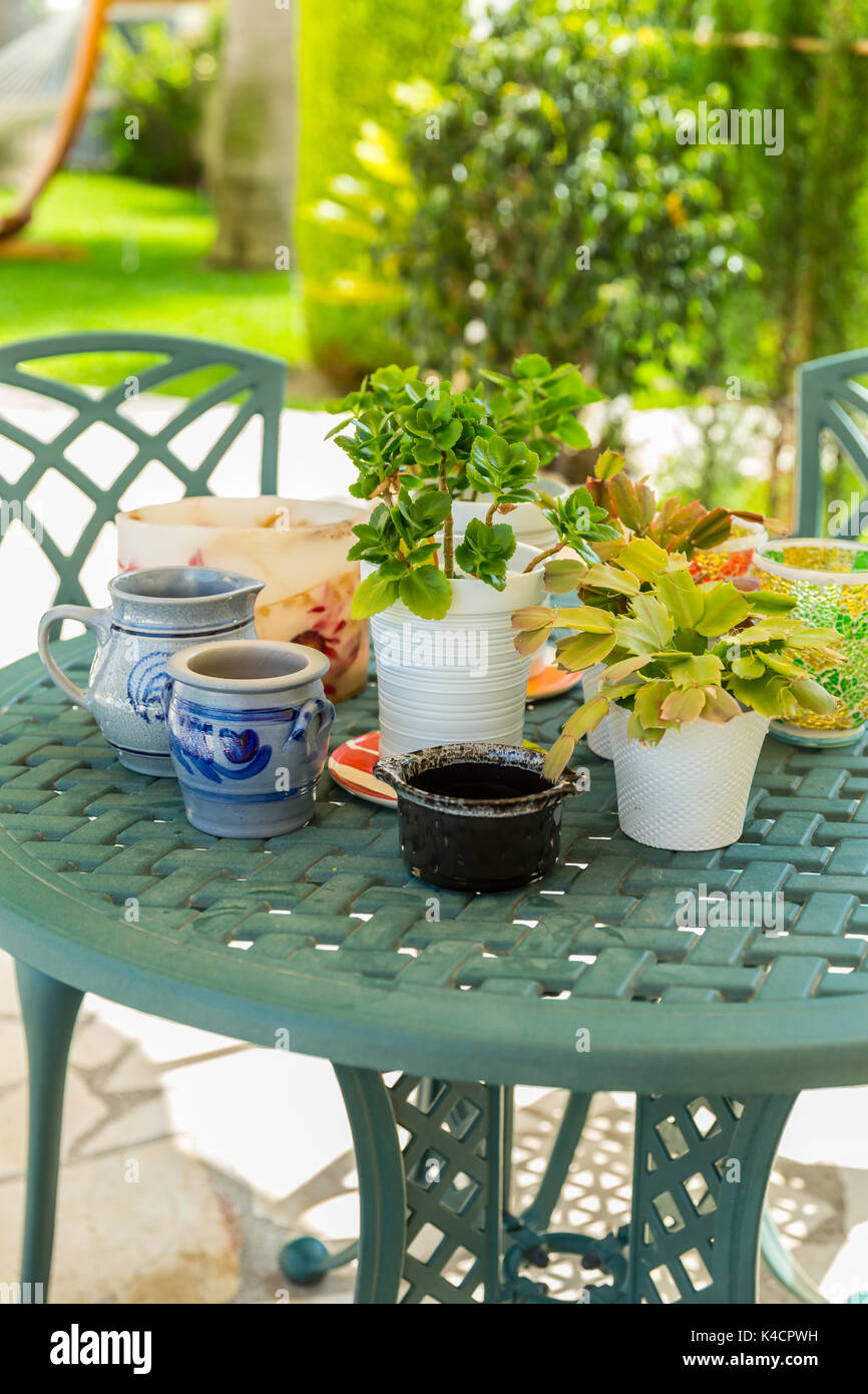 Patio table with flower pots hi-res stock photography and images - Alamy
