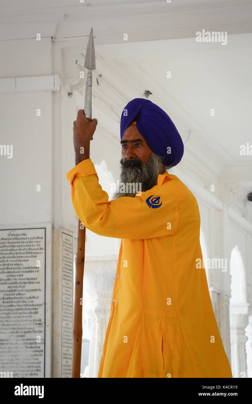 Amritsar, India - Jul 25, 2015. A Sikh guard in traditional clothes at ...