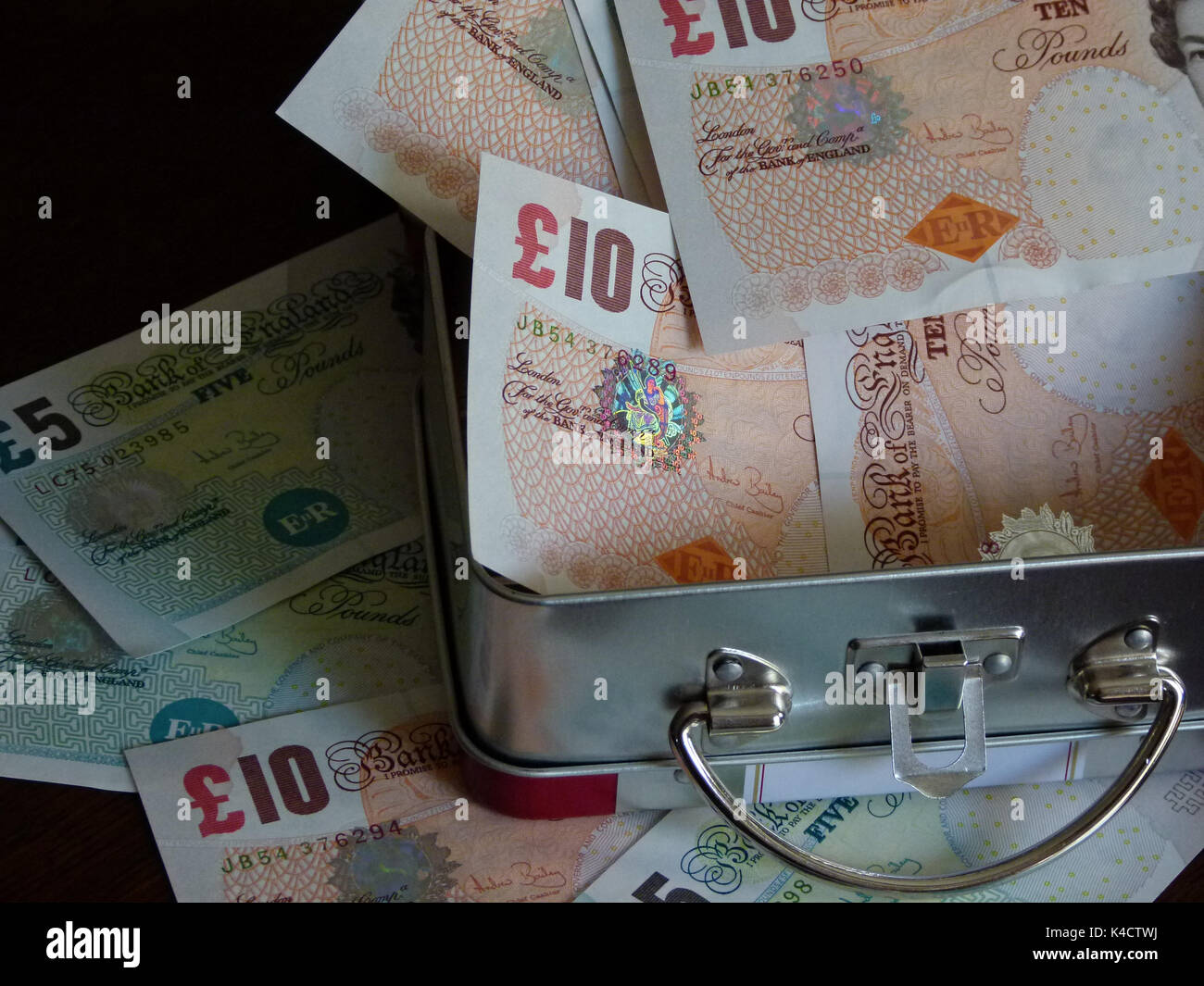 Suitcase money english hi-res stock photography and images - Alamy