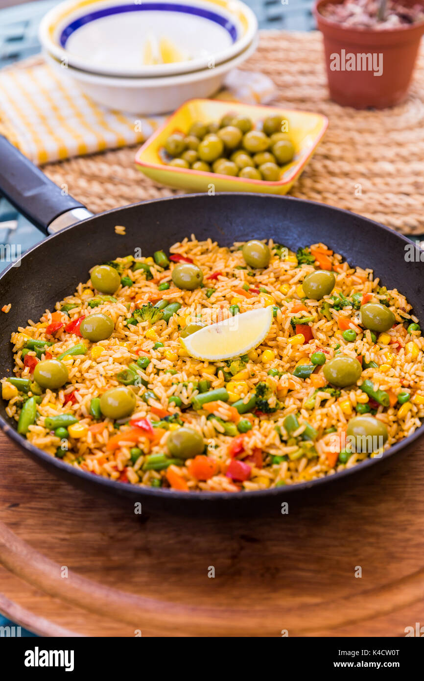 Traditional spanish rice dish - vegetable paella Stock Photo - Alamy
