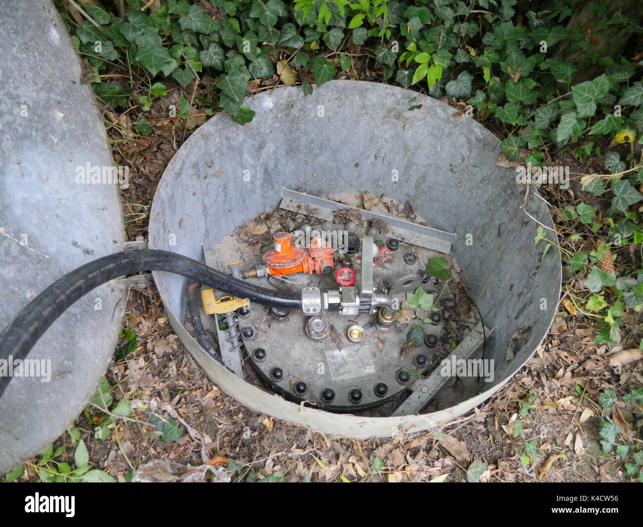 Gas Delivery Ground Tank Stock Photo - Alamy