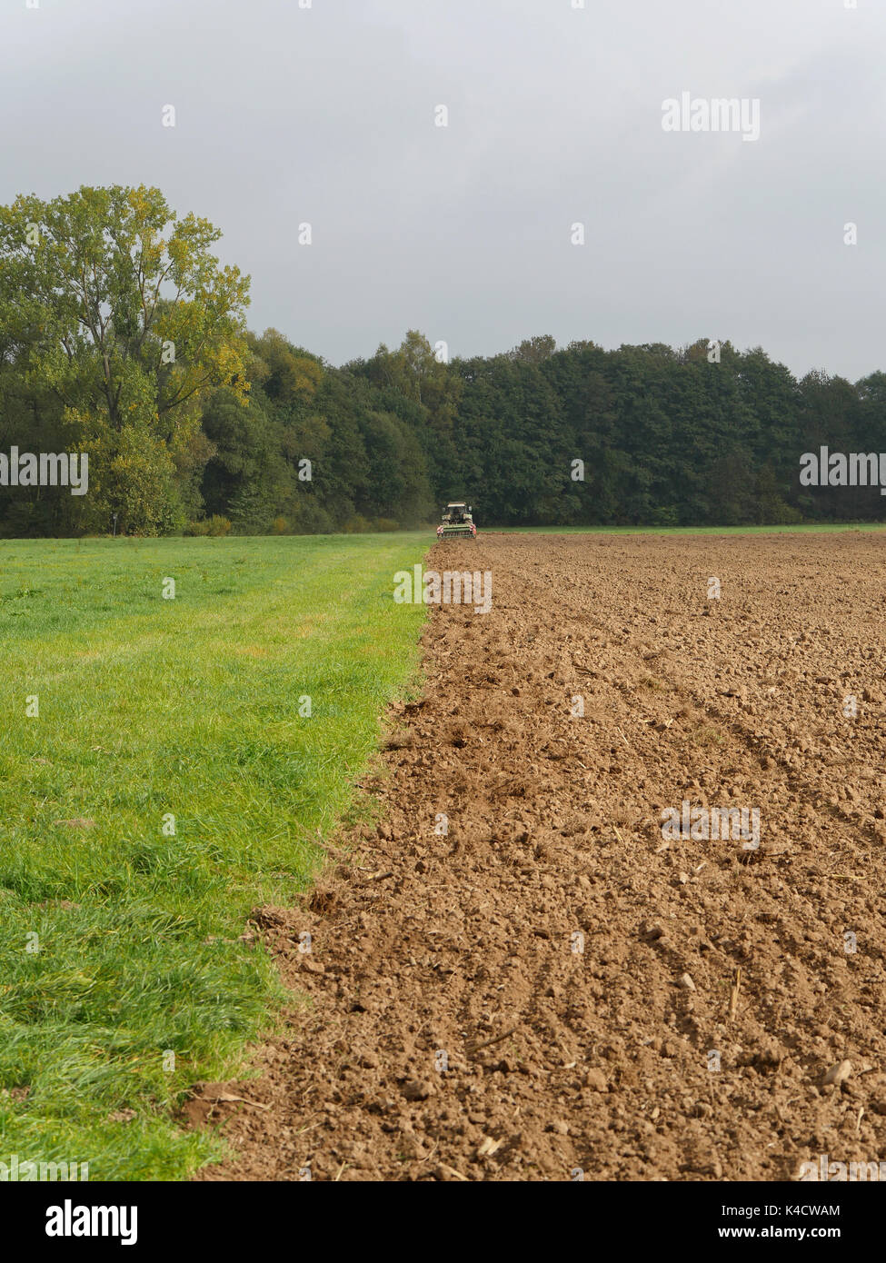 Farmer harrowing field hi-res stock photography and images - Alamy