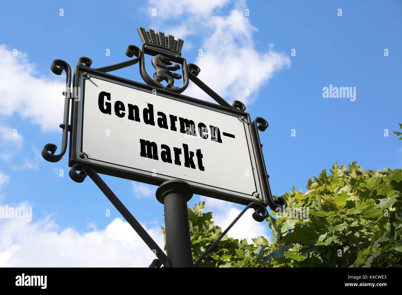 road sign indicating the square called Gendarmenmarkt one of the most ...